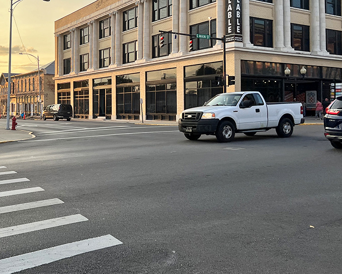 Sunset bathes downtown Bellefontaine in golden light. Even pickup trucks look poetic at magic hour in small-town Ohio.