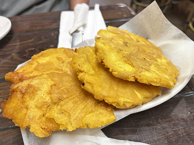 These tostones aren't just fried plantains; they're golden discs of tropical sunshine that make the perfect vehicle for whatever sauce you fancy.