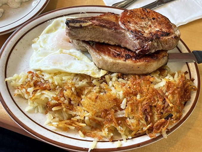 Pork chops, eggs, and hash browns&mdash;the breakfast of champions who plan to skip lunch and possibly dinner. Morning ambition on a plate.