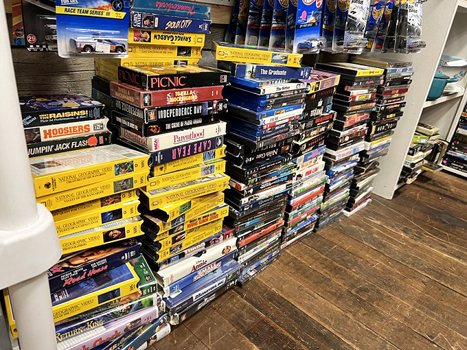 The VHS motherlode! "Picnic" next to "Independence Day" proves video stores had better range than Netflix. Just don't ask about rewinding fees.