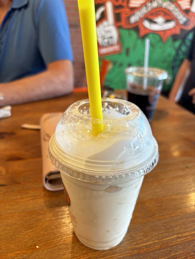 A vanilla shake so thick, the straw stands at attention. The perfect cool companion to a burger adventure.