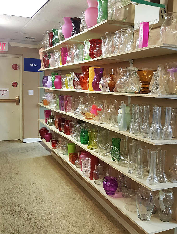 A rainbow of glass vases catches the light like an indoor sunset &ndash; from mid-century modern to Victorian, each with stories to tell.