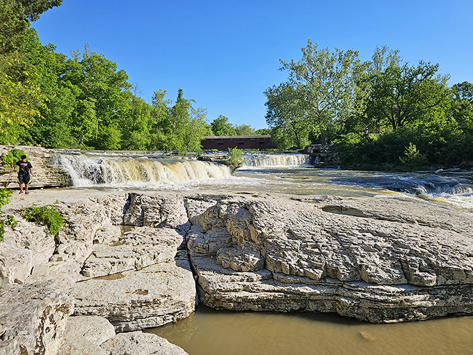 The falls and bridge create a perfect pairing &ndash; like peanut butter and jelly, if PB&J were made of limestone and timber.