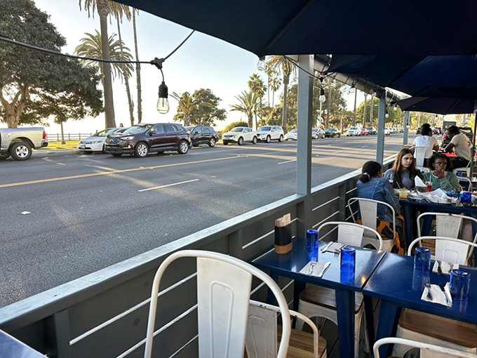 The view that comes complimentary with your meal: palm trees, ocean breezes, and the distinct feeling that life is pretty darn good.