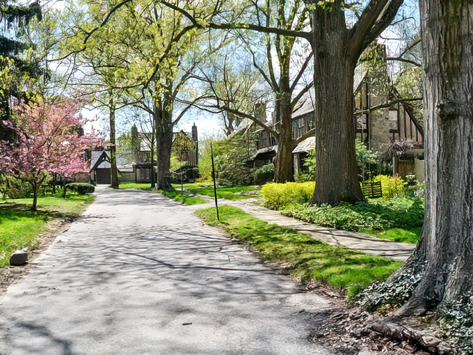 Spring unfurls along Mariemont's residential streets, where flowering trees and historic homes create postcard-worthy vignettes at every turn.