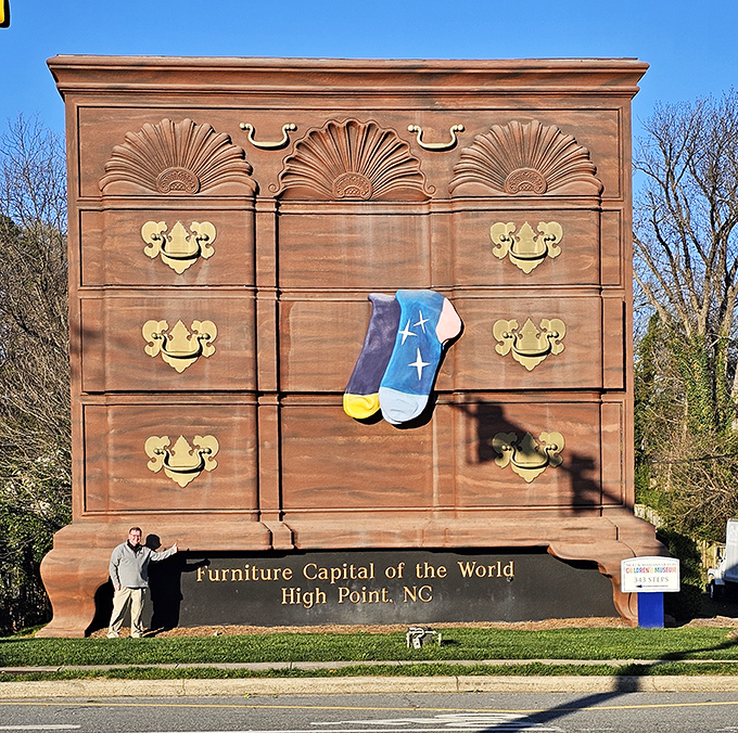 How tall AM I? Let me stand next to something for scale. This visitor found the perfect measuring stick in High Point.
