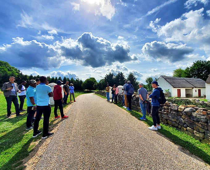 History is better with company. Visitors gather along the museum's pathways, proving that our fascination with how our ancestors lived never goes out of style.