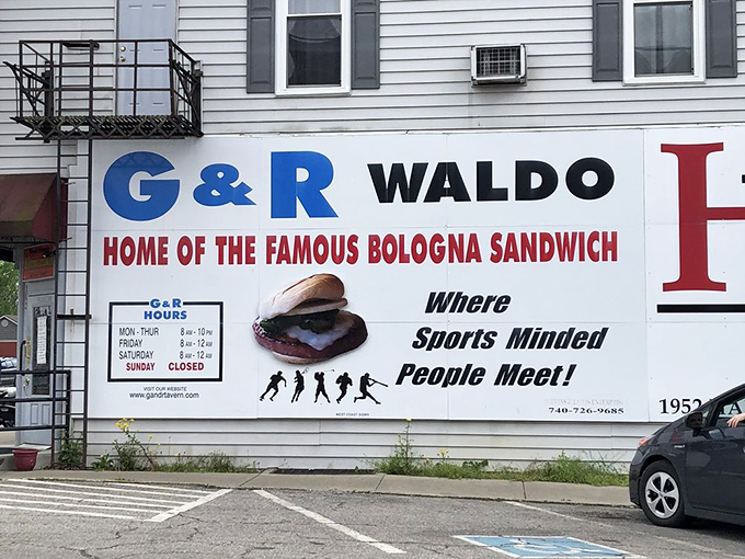 The sign proudly proclaims G&R's famous bologna sandwich. Like a small-town billboard for the Louvre, it announces a masterpiece worth traveling for.