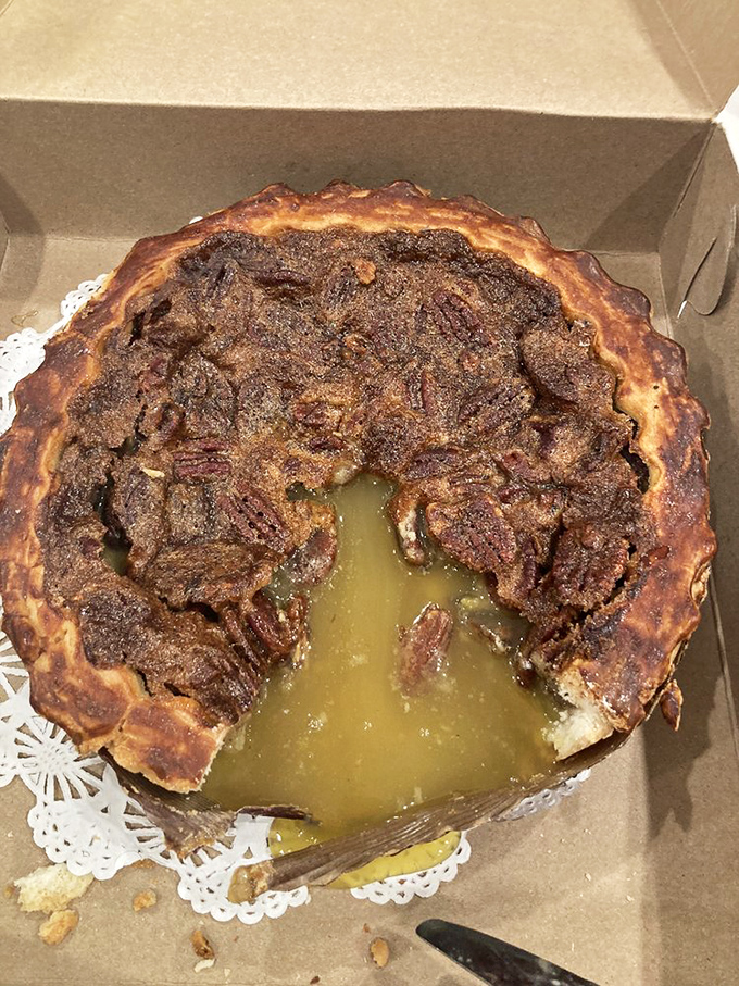 This walnut pie isn't just dessert—it's a gooey, nutty revelation. The missing slice wasn't stolen; it simply couldn't wait to fulfill its destiny.