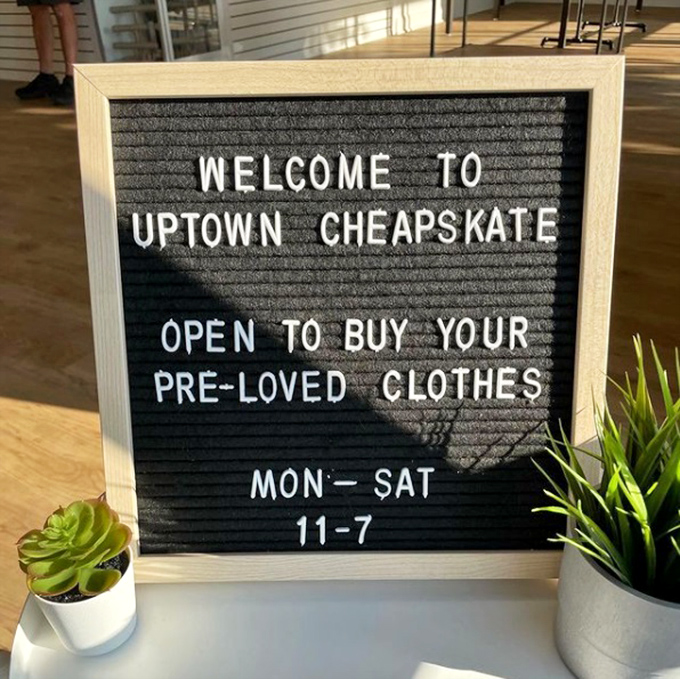 A welcome sign that perfectly captures the spirit of the place&mdash;where "pre-loved" is preferred to "secondhand" and savings are always in style.