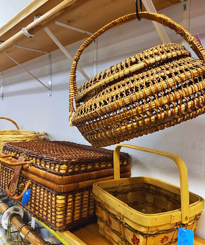 Wicker baskets hanging like ripe fruit, ready to be picked by shoppers with empty corners and picnic aspirations.
