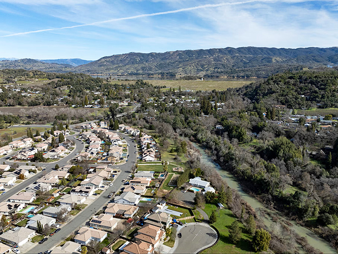 Ukiah's breathtaking valley setting reveals itself in this aerial view, where neighborhoods nestle between rolling hills and the Russian River.