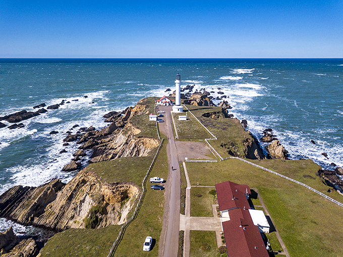 Bird's eye brilliance! This aerial view reveals what the seagulls have known all along&mdash;Point Arena Lighthouse sits on California's most dramatic stage.