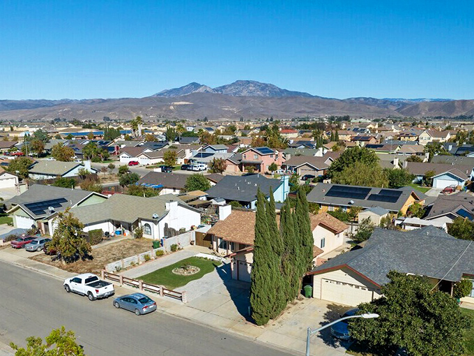 From above, Greenfield reveals its perfect placement&mdash;residential comfort nestled between mountain majesty and valley abundance.