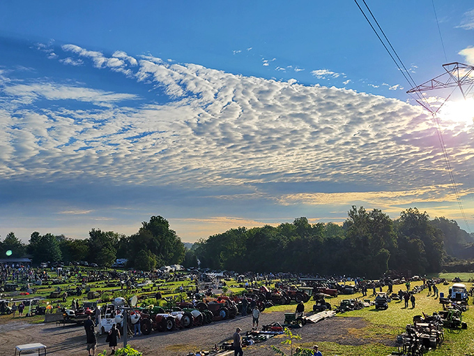 Heaven meets earth at Williams Grove. The sprawling market unfolds beneath dramatic cloud formations, drawing hundreds of treasure hunters to this Pennsylvania institution.