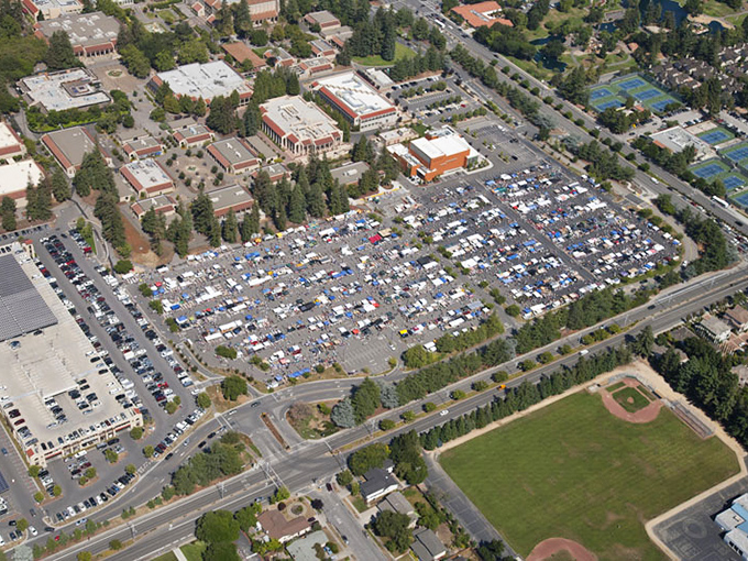 From above, the market resembles a colorful patchwork quilt spread across the campus. Each tiny square below represents someone's passion, livelihood, or decluttering mission.
