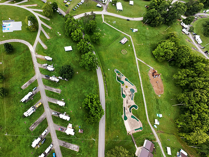 From above, the campground reveals itself as a perfectly organized community of adventure-seekers, temporary neighbors sharing this slice of paradise.