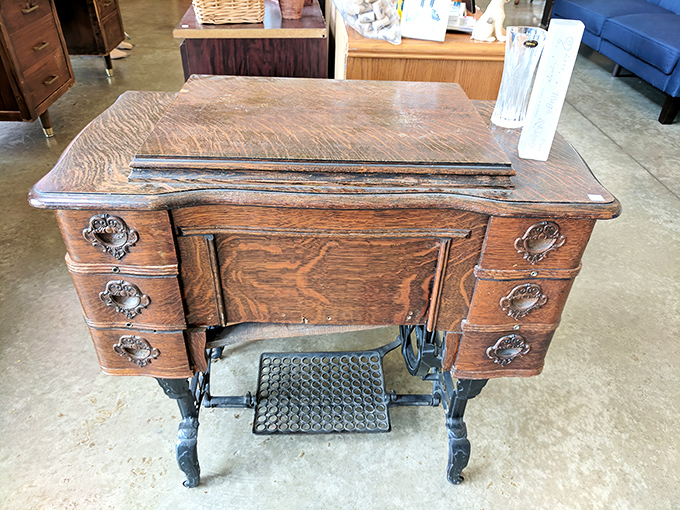 Not just a sewing table&mdash;this antique treadle is a functional piece of Americana that brings character no mass-produced furniture can match.
