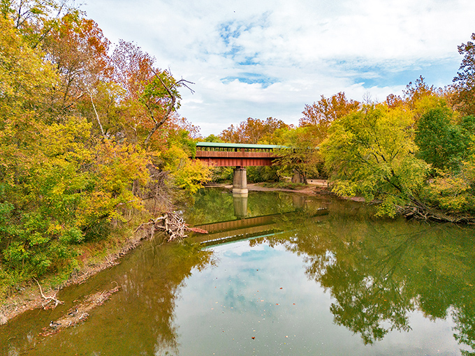 Autumn transforms this bridge into something so beautiful, even the trees seem to dress up for the occasion.
