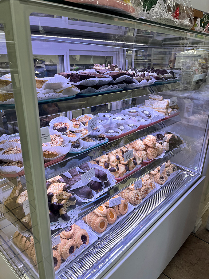 The display case – where time stands still, diets are forgotten, and the only appropriate response is "I'll take one of each, please."