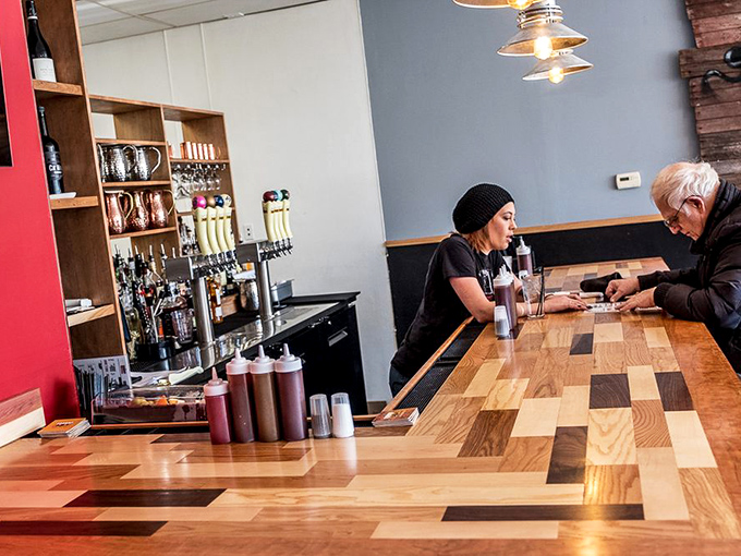 A bar crafted from patchwork wood—like the barbecue philosophy itself: different elements coming together to create something beautiful.