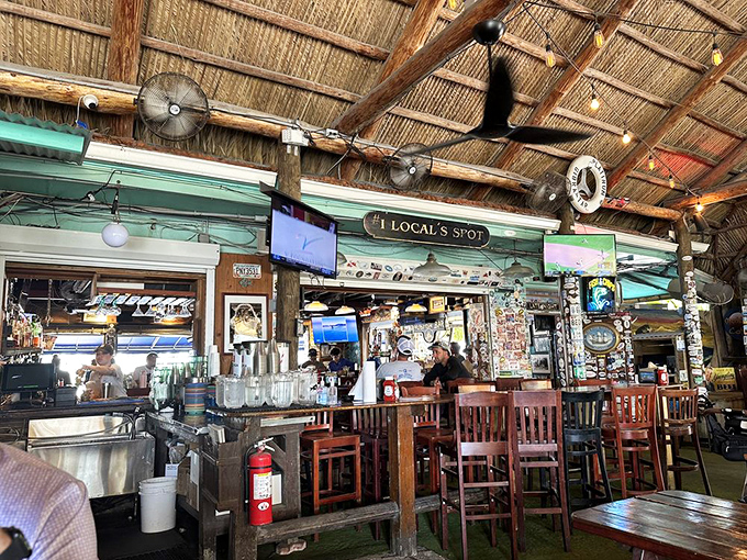 The sign says "Local's Spot" and they mean it. This bar has witnessed more authentic Florida Keys stories than a century of travel guides.