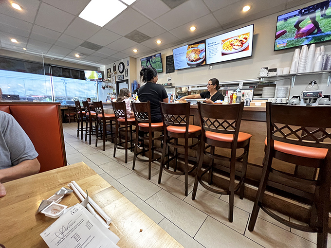 Counter seating: where solo diners become part of the Olympic family and regulars exchange news of the day over bottomless coffee cups.