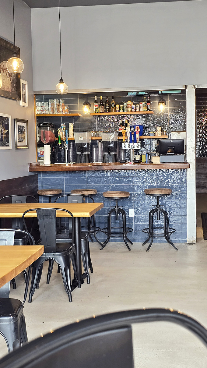 The bar area offers a moment of civilized pause before diving face-first into the gloriously uncivilized act of proper barbecue consumption.