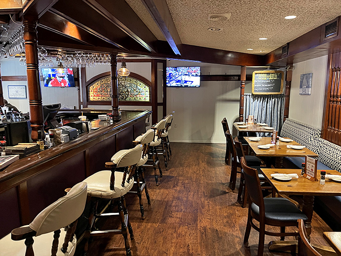 The bar area where nautical meets practical&mdash;a cozy corner where seafood stories get better with each retelling and every glass raised.