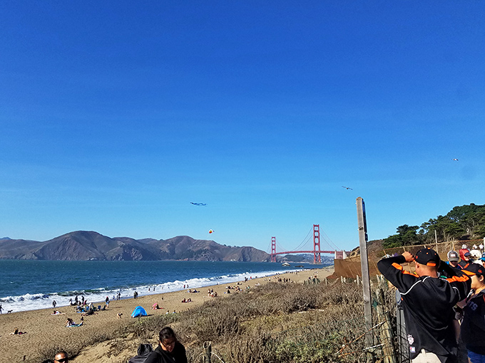 Beach days in San Francisco: where sunbathers and sweater-wearers coexist in perfect harmony, united by that spectacular Golden Gate view.