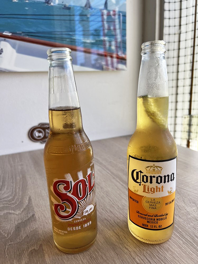 Cold beers waiting patiently to wash down seafood treasures—like loyal sidekicks in the superhero movie of your lunch.