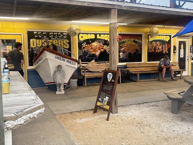 Wooden benches outside Hunt's where patient seafood lovers wait their turn, knowing that some pleasures are worth sitting for.