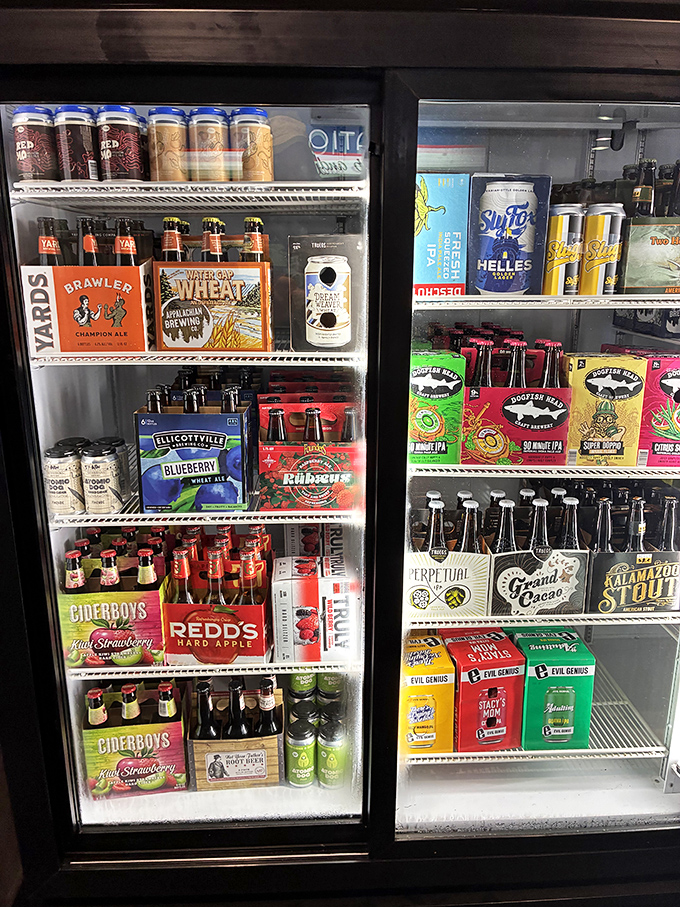 This isn't just a beer cooler—it's an adult candy store featuring Pennsylvania favorites alongside craft brews from across the country.