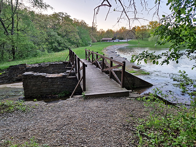 This rustic bridge isn't just crossing water&mdash;it's connecting you to the simpler side of life waiting on the other bank.