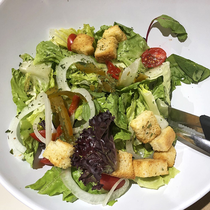 Even the salads show up ready to impress. Crisp greens and house-made croutons prove Big Mike's excellence extends beyond bread and meat.
