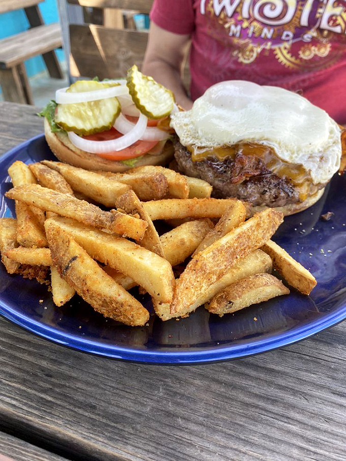 This isn't just a cheeseburger&mdash;it's an argument against fancy food. Crispy fries, melted American cheese, and a perfectly toasted bun make life worth living.
