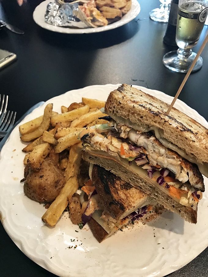 Sandwich architecture at its finest&mdash;layers of flavor between perfectly toasted bread, with those hand-cut fries making a compelling supporting argument.