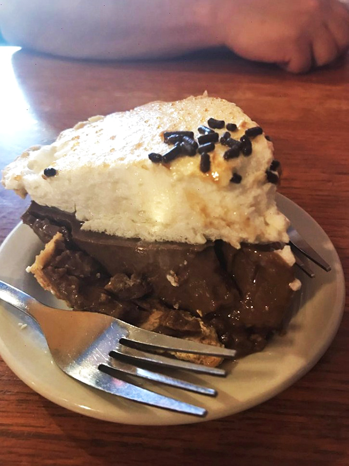 Chocolate cream pie with mile-high meringue&mdash;the kind of dessert that makes you understand why they put "Eat Dessert First" on the wall.