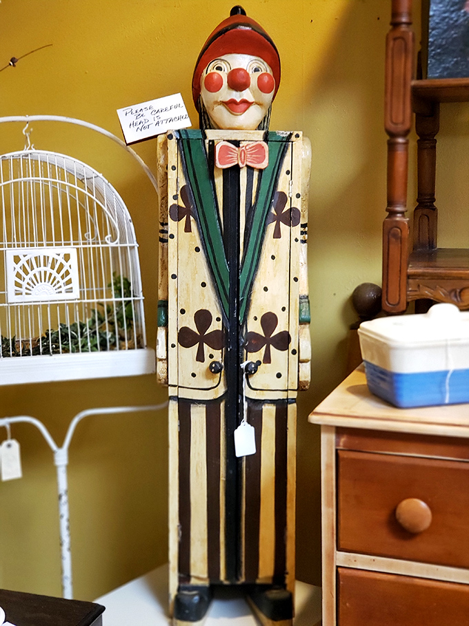 This vintage clown cabinet proves that yesterday's whimsy can be today's conversation piece, complete with clubs suit details and rosy cheeks.