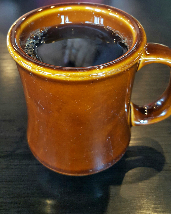 This isn't just coffee&mdash;it's morning motivation in ceramic form. The mug's substantial heft suggests it takes its responsibility to wake you up very seriously. 