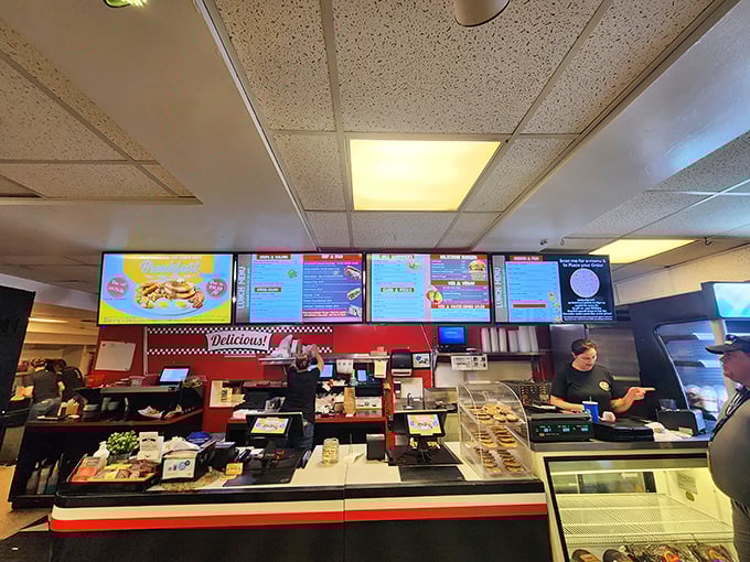 The counter where sandwich dreams come true. No fancy theatrics, just efficient assembly of deliciousness.
