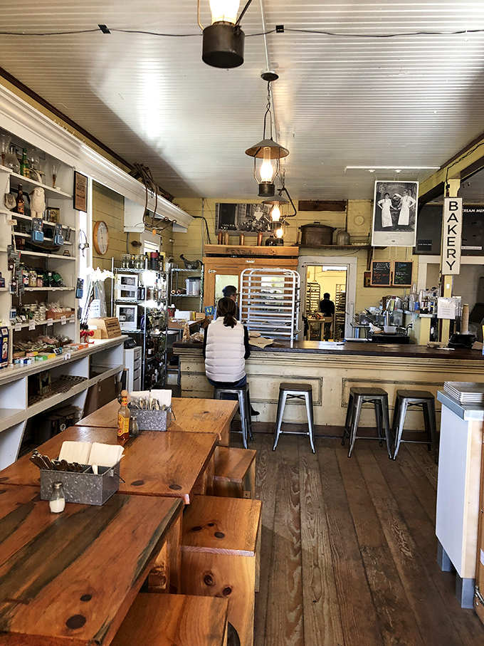 The heart of the operation &ndash; where sandwiches are born and coffee flows freely under the watchful glow of vintage lanterns.