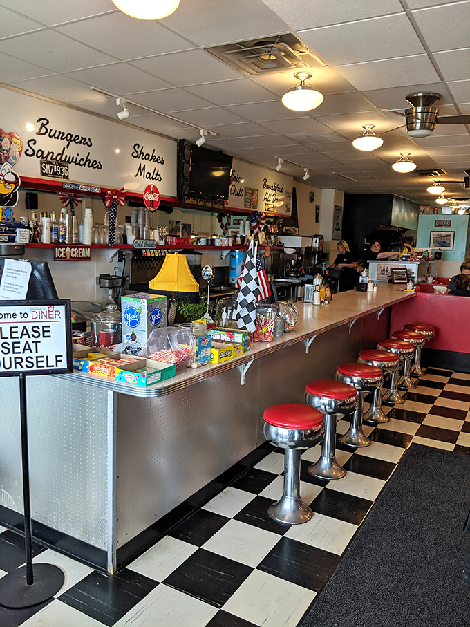 Counter seating that gives solo diners a front-row view to short-order magic, where spatulas fly with the precision of Olympic gymnasts.