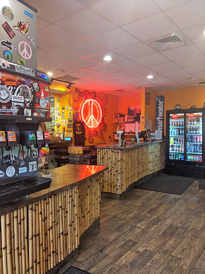 Peace, love, and burritos. The bamboo counter and neon peace sign create a laid-back vibe that says "relax, good food is coming."