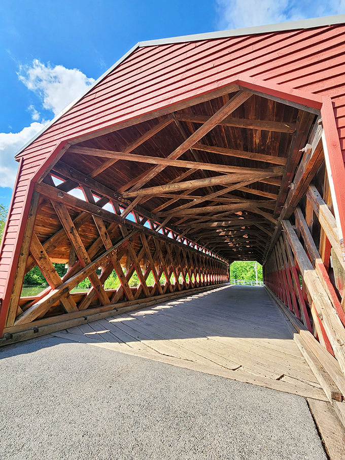 Sunlight creates mesmerizing patterns through the wooden lattice. Those diagonal beams aren't just pretty&mdash;they're an engineering marvel that's stood for generations.