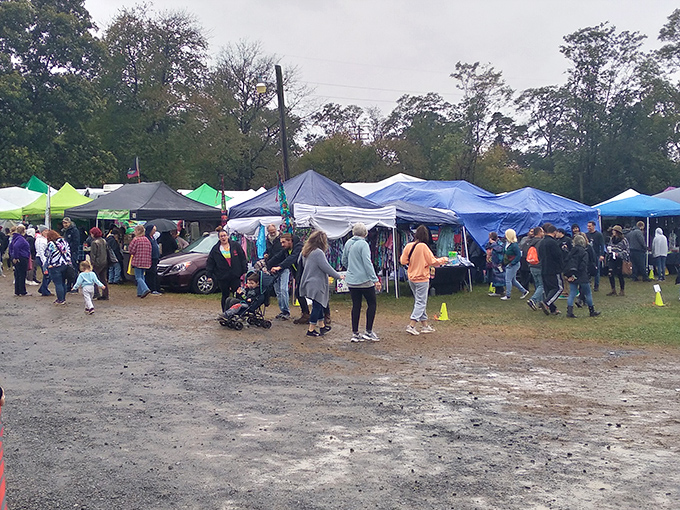 The outdoor market buzzes with weekend warriors hunting for deals. Rain or shine, the treasure hunt continues under colorful tents.
