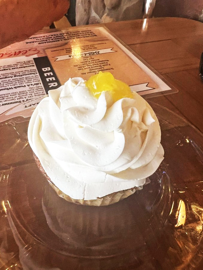 The perfect sweet ending: a classic cream-topped cupcake that doesn't need fancy frills or trendy flavors. Sometimes simple pleasures are the most satisfying.