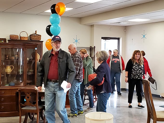 The thrill of the hunt brings people together. These shoppers share that universal expression of "Did I just find the deal of the century?"