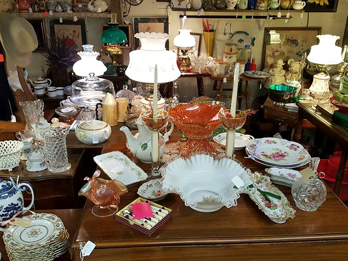 This table isn't just covered in glassware and china&mdash;it's a buffet of bygone craftsmanship where each piece whispers, "They don't make 'em like this anymore.