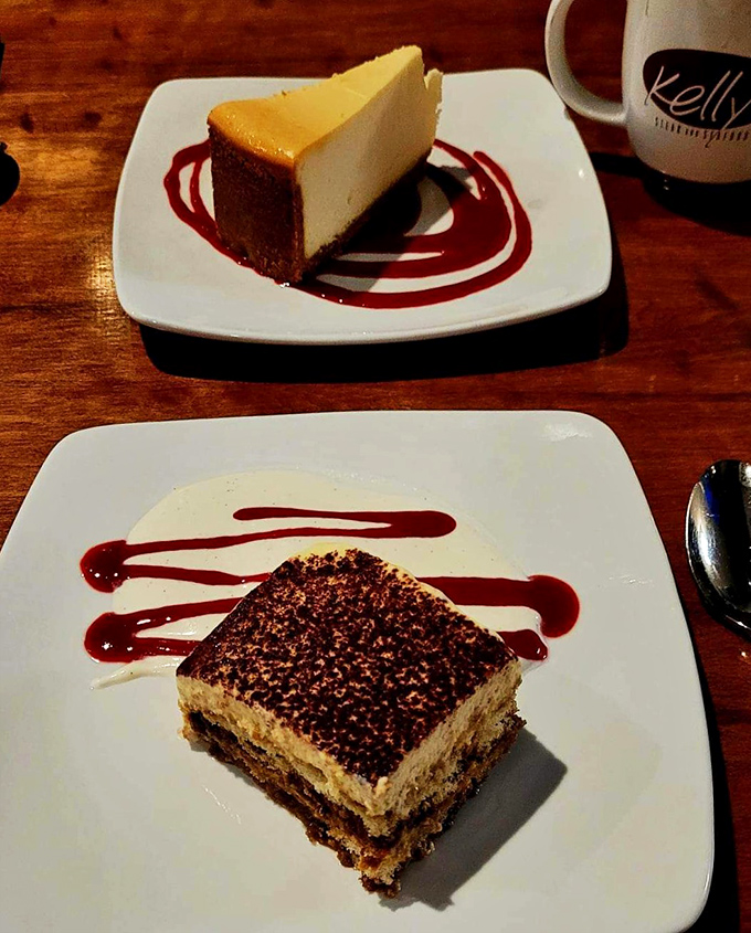 Desserts that demand to be photographed before devoured. Tiramisu and cheesecake presented with artistic flair and berry coulis drama.